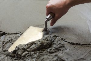 Ciment prompt : caractéristiques, utilisations et dosage